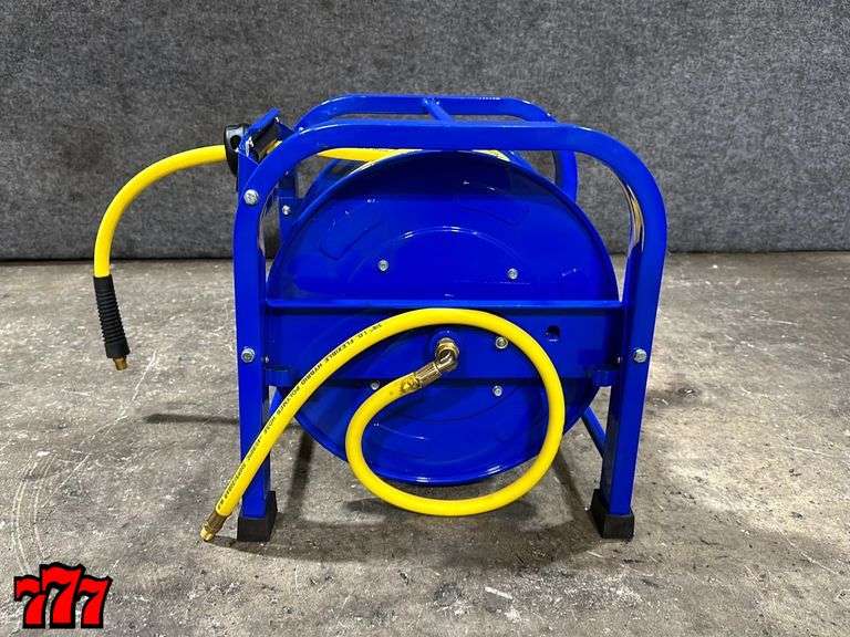 New Unused GoodYear Steel Spring Driven Reel - 777 Auction Company