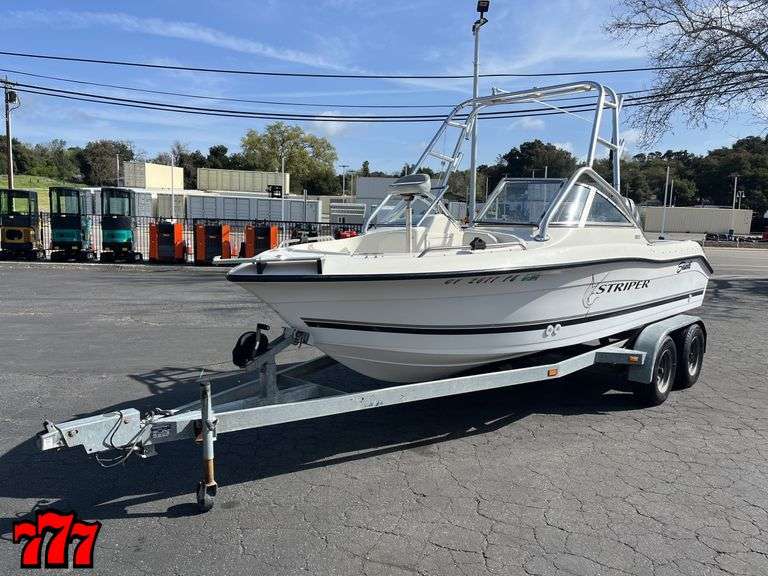 2001 SeaSwirl Striper 18’ Boat Model 1851 - 777 Auction Company