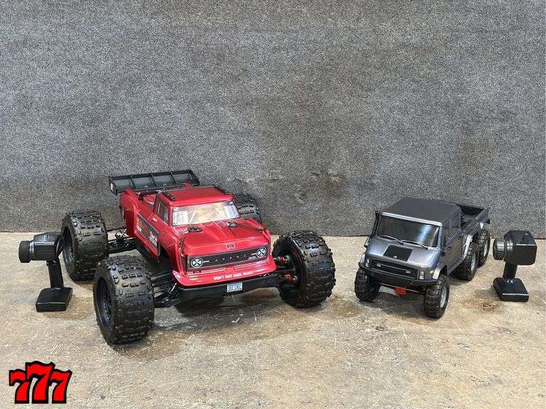 2 RC Cars w/ Charger - 777 Auction Company