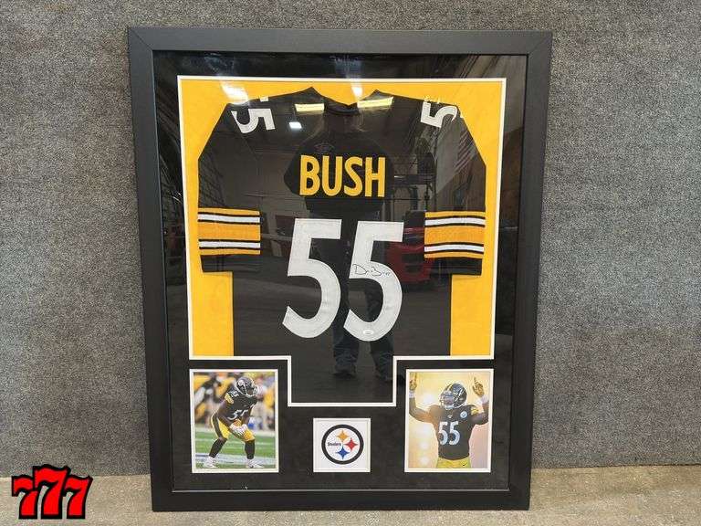 Framed Signed Devin Bush Jr. Jersey & Pictures - 777 Auction Company
