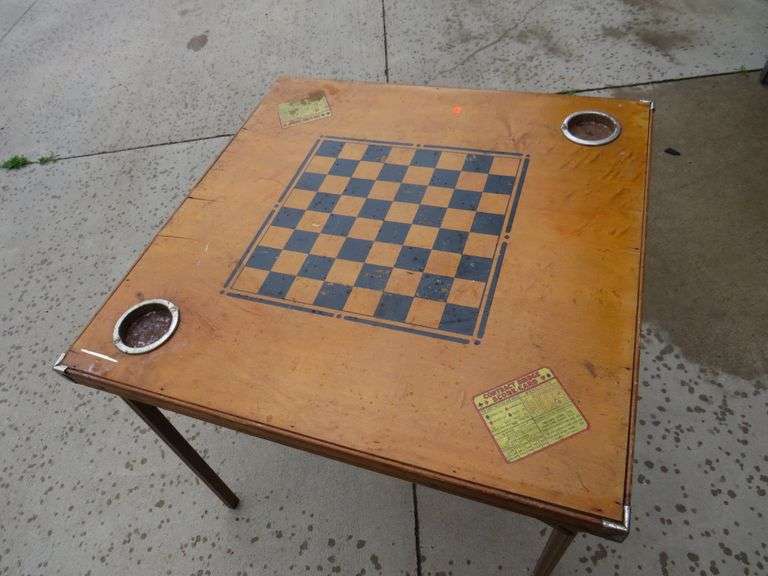 Vintage card table with folding legs. Check out the built-in ashtrays ...