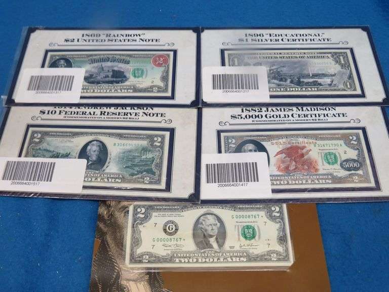 Three colorized $2 bills, one colorized $1 bill, and one $2 Star Note ...