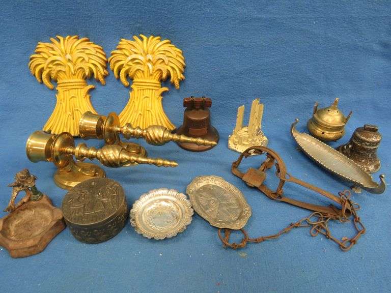 Collectible metalware including an advertising bank, cast iron ashtray ...