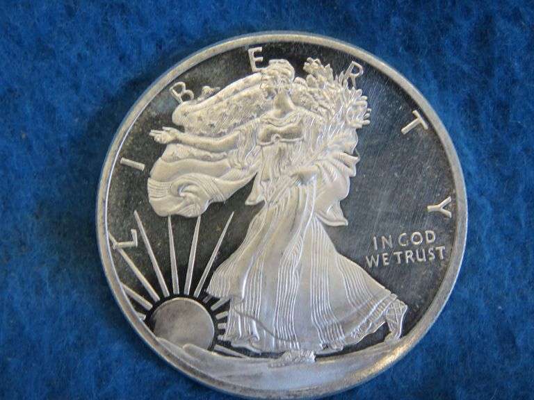 1 oz .999 silver Mint Walking Liberty Silver Round - AAA Auction and Realty