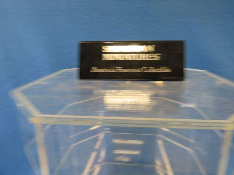 Three-tiered octagon shaped display cabinet. 21" tall and 16" wide ...