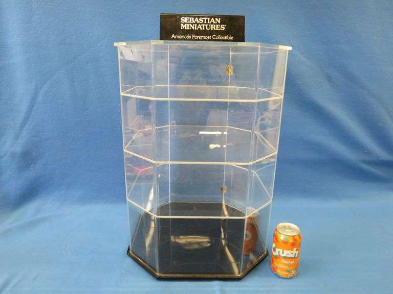 Three-tiered octagon shaped display cabinet. 21" tall and 16" wide ...
