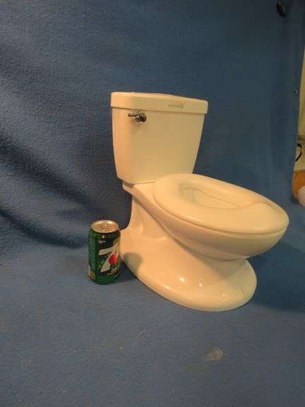 Potty training chair with flush sounds - AAA Auction and Realty