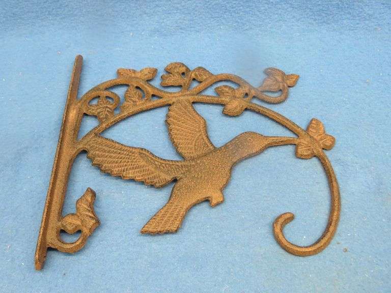 Hummingbird cast iron plant hanger - AAA Auction and Realty