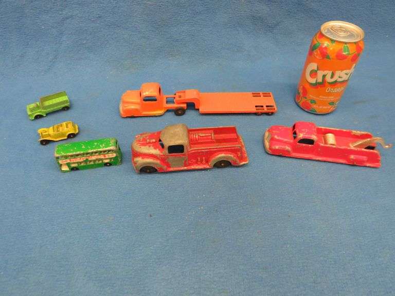 Six toy metal cars. All wheels intact. - AAA Auction and Realty
