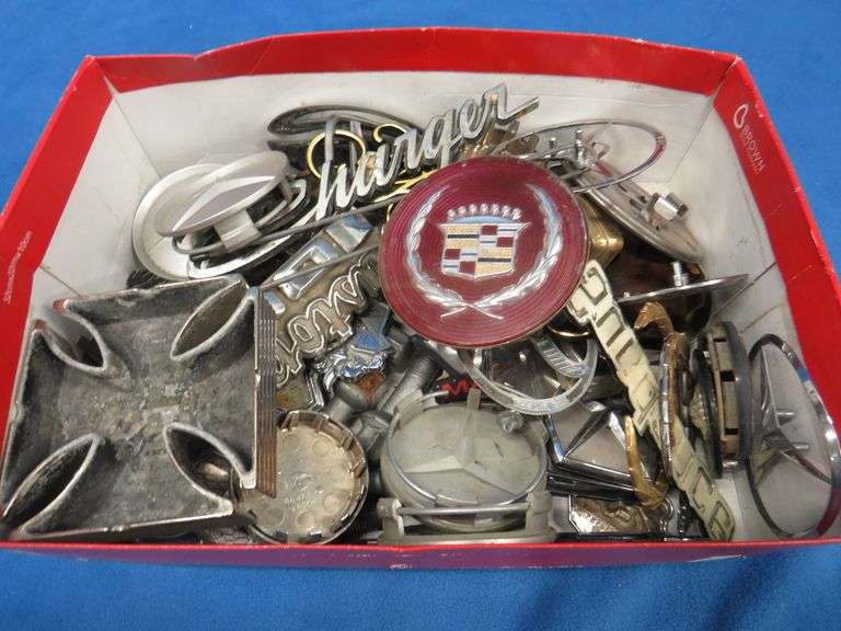 Large group of auto emblems and more - AAA Auction and Realty