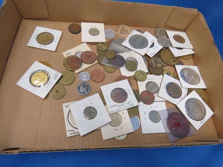 Treasure Trove of Tokens - AAA Auction and Realty