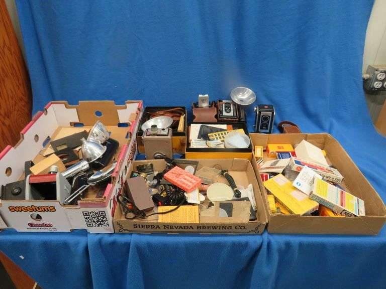 Two big boxes of vintage cameras, equipment, and supplies - AAA Auction ...