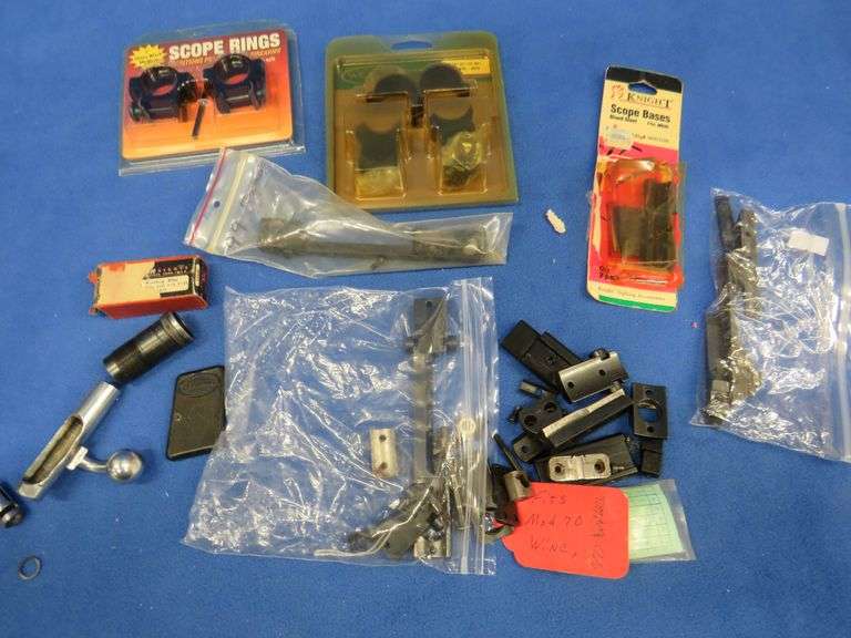 Misc. gun parts and scope rings - AAA Auction and Realty
