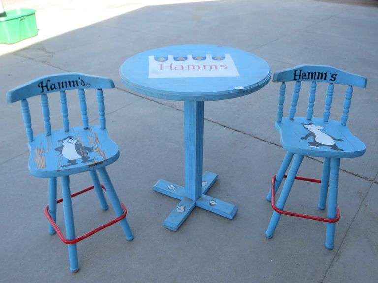 Hamm's Beer wooden table and two chairs. - AAA Auction and Realty