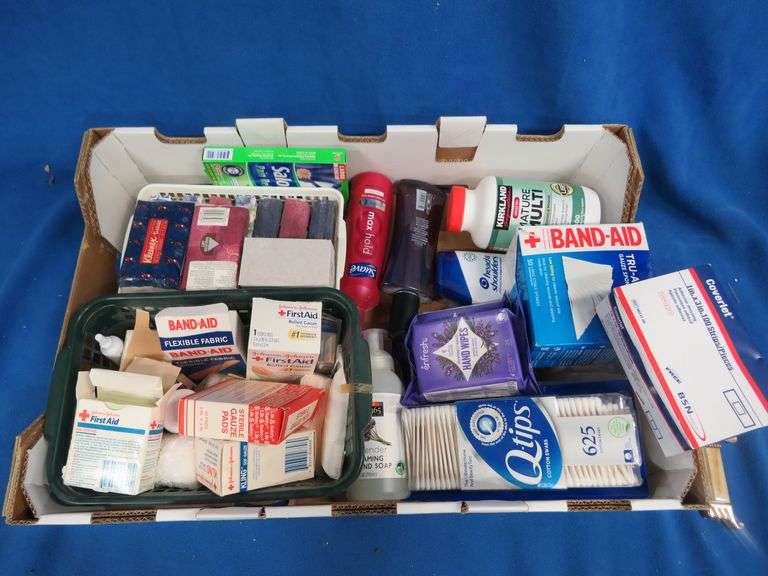 First aid lot including, bandages, Kleenex, Q-tips, soap, and much more ...