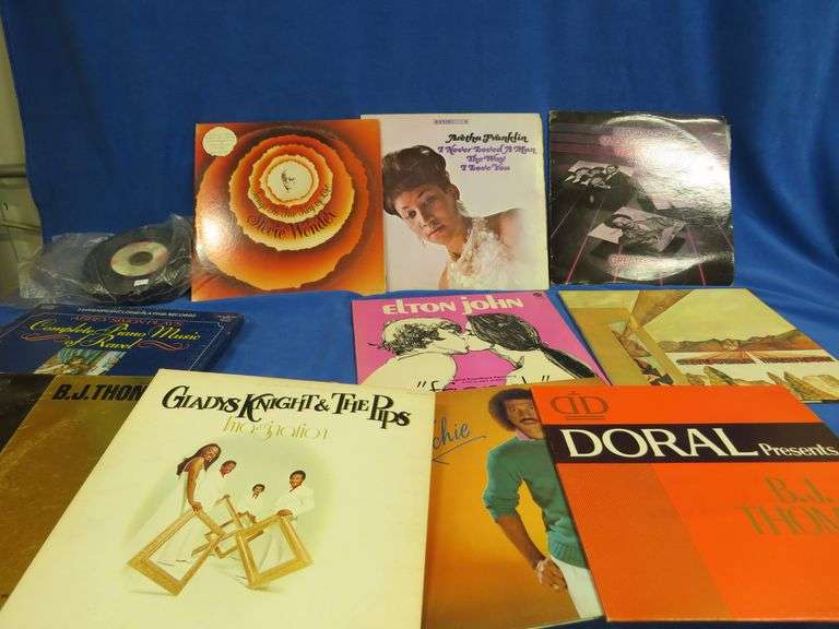 Record Albums: - AAA Auction and Realty