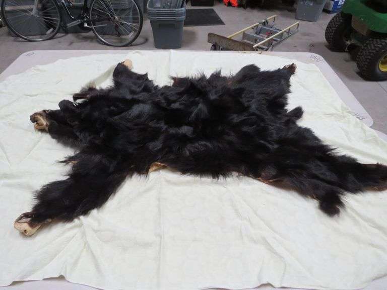 Tanned black bear hide without claws - AAA Auction and Realty