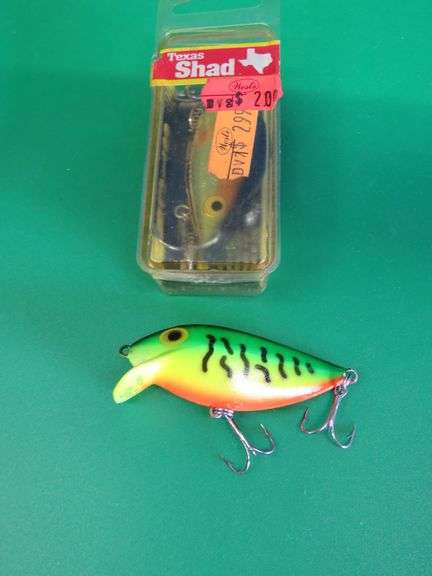 Storm Texas Shad in the box and a Thin Fin - AAA Auction and Realty