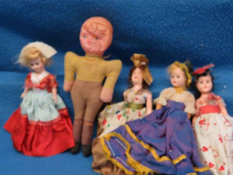 Four vintage sleepy eye bakelite (?) Dolls and a old football player ...
