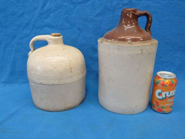 Two stoneware jugs - AAA Auction and Realty