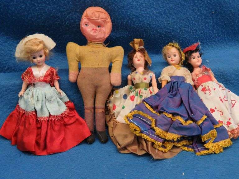 Four vintage sleepy eye bakelite (?) Dolls and a old football player ...