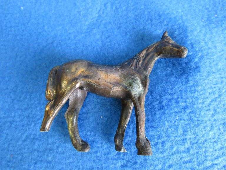 Cast iron cowboy and Indian figurines - AAA Auction and Realty