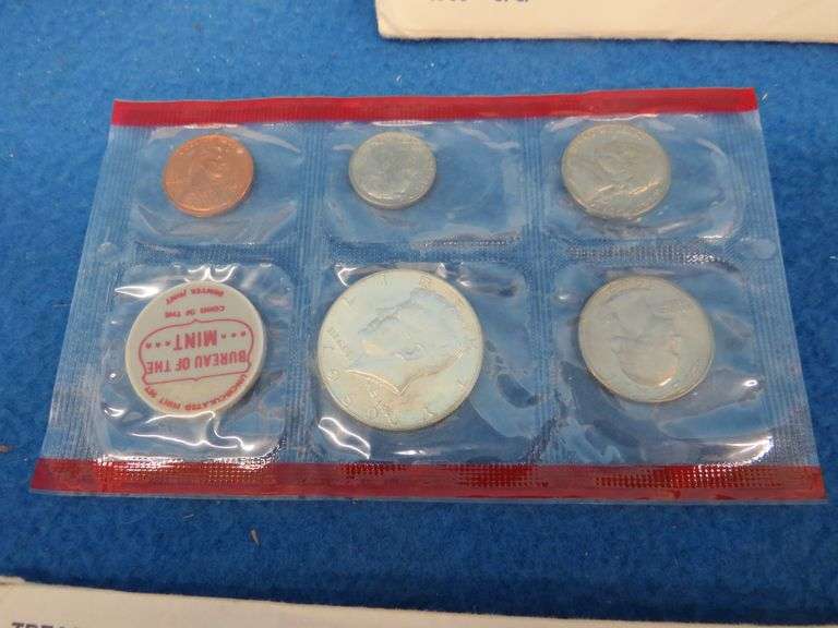 Three 1969 US Mint Uncirculated sets. Each set contains coins from both the Philadelphia and ...