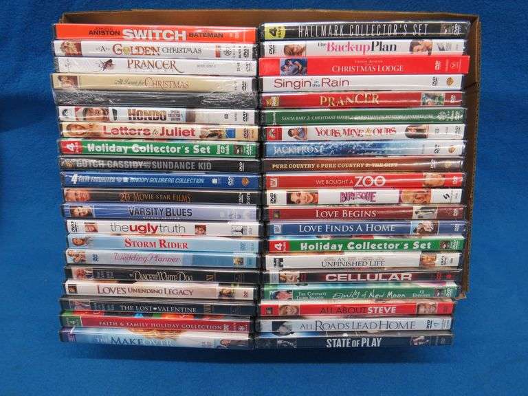 40 new in the package DVDs. Titles as pictured. - AAA Auction and Realty