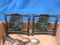 Silverplate silverware from different makers and a pair of cast Native ...