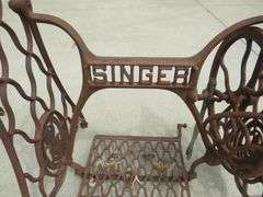 Two treadle sewing machine cast iron frames, one Singer and one White ...