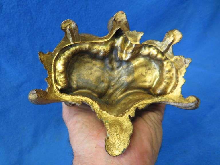 Antique non-working clock in an Art Nouveau style cast metal frame ...