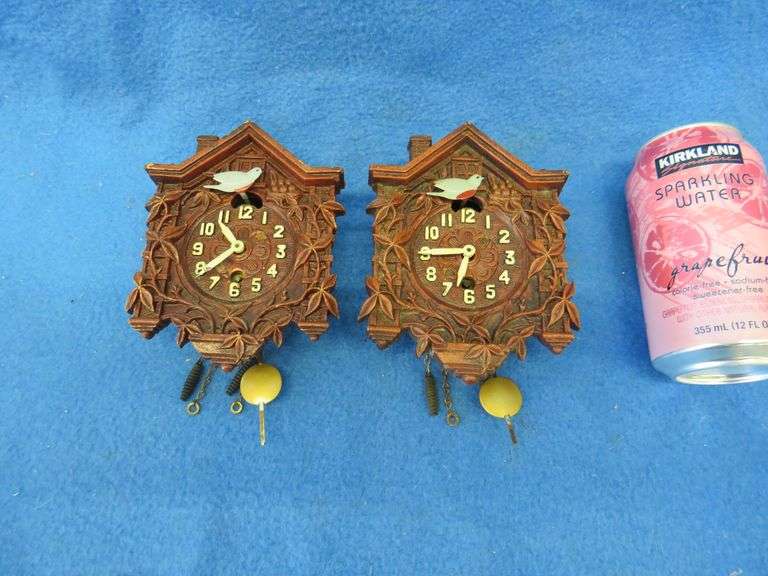 Two animated Lux bird clocks. No keys. Owner-printed info said they are ...