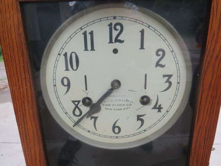 Antique time clock in an oak case. Made by the Interboro Time Clock Co ...