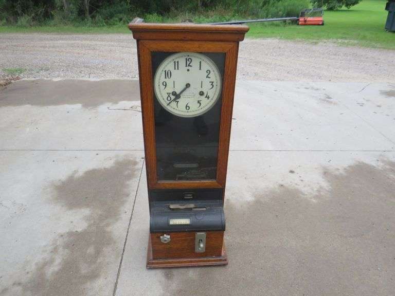 Antique time clock in an oak case. Made by the Interboro Time Clock Co ...