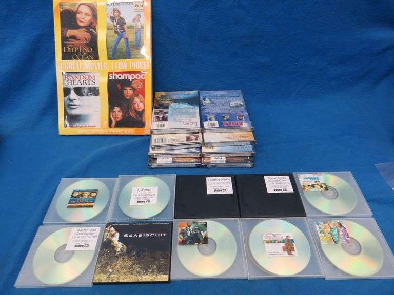 DVDs and video CDs as pictured - AAA Auction and Realty