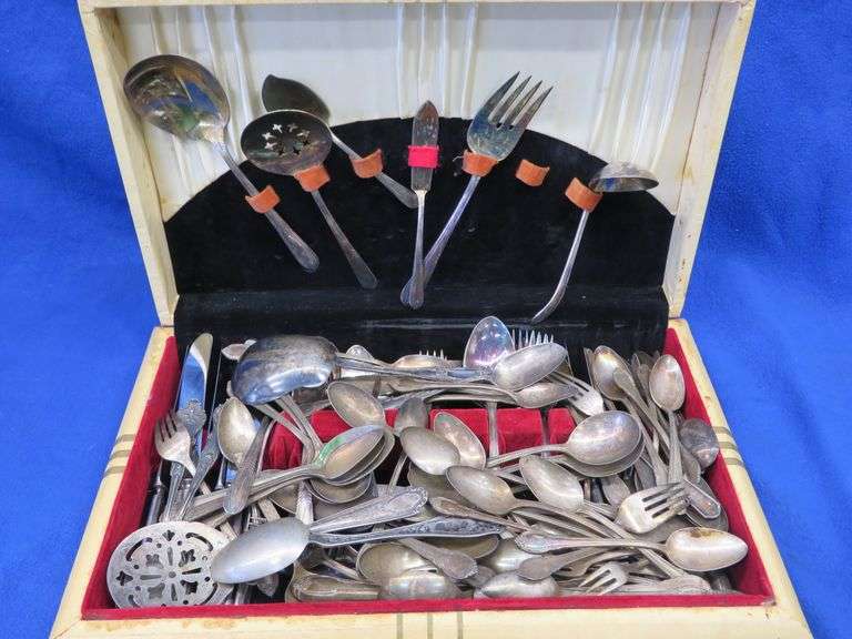 Large collection of non-matching flatware in a case, some is marked ...