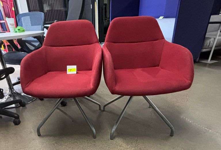 TWO RED SWIVEL CHAIRS - Auctions and Services Unlimited