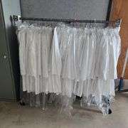 Rack of Small and Extra Small Lab Coats - (Rack Not Included) - Acesbid