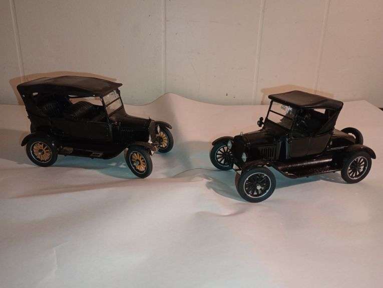 2 Old cars- 1925 Ford Model T touring car and 1925 Ford Model T ...