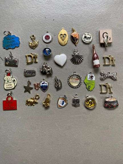 Assorted charms - Lil Dusty Online Auctions - All Estate Services, LLC