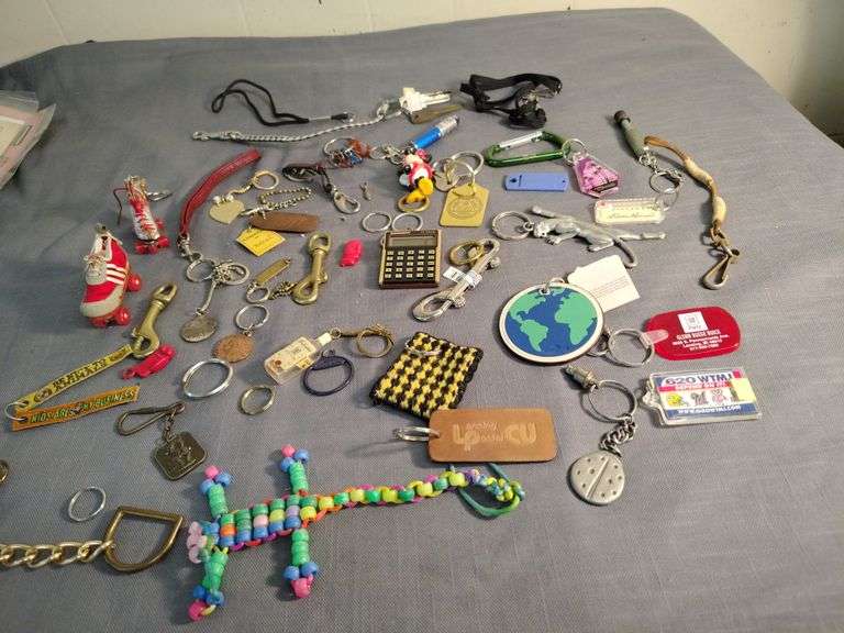 Variety of keychains - Lil Dusty Online Auctions - All Estate Services, LLC
