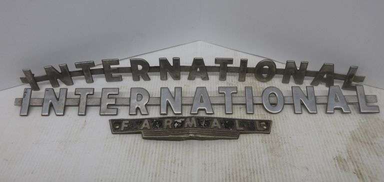 (2) Old International Truck Emblems, and a Farmall Tractor Emblem ...