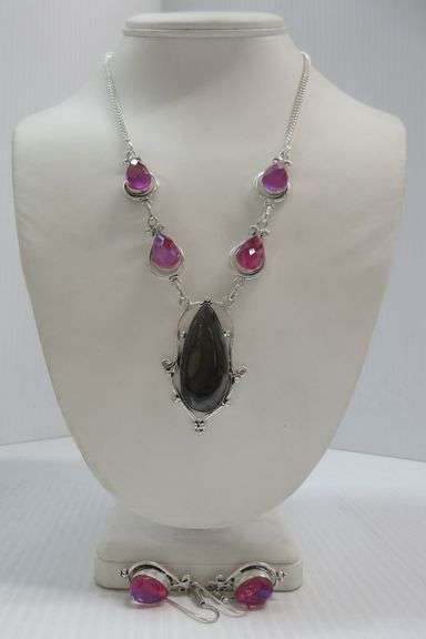 Variegated Blue and Gray Quartz Stone with Four Pink Quartz Stones ...