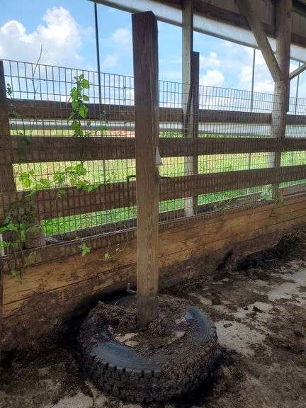 6" x 6" Post Anchored in Concrete Filled Large Diameter Tire, Was Used ...