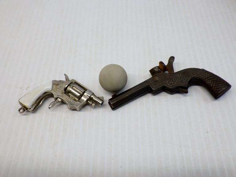 Musket ball; Trueno pistol keychain, made in Spain, 1 3/4"L; Big Chief ...