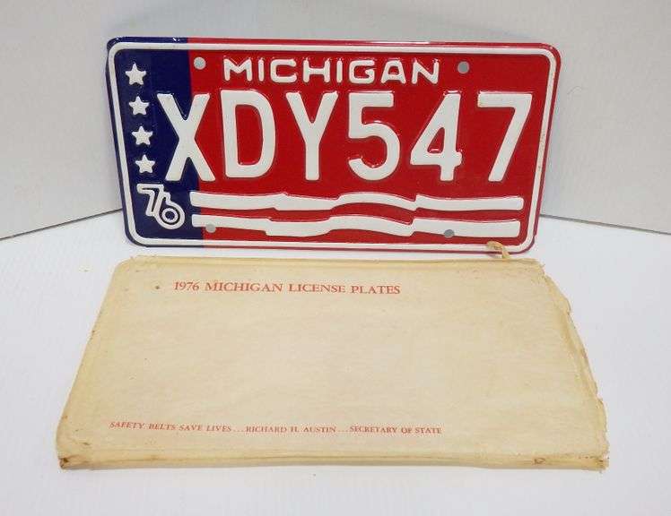 1976 License plate, in original package, 12"W - Albrecht Auction Service