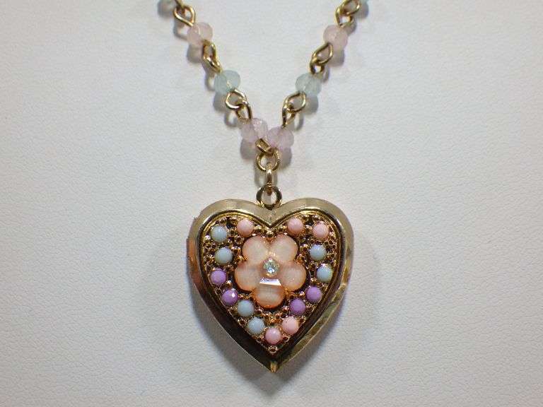 Heart locket on chain, adjustable to 23"L, never worn, includes bag in ...