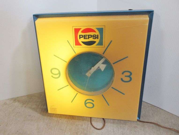 Older Pepsi clock, lights up, 15 1/8"W x 3 3/4"D x 16"H, does not run ...