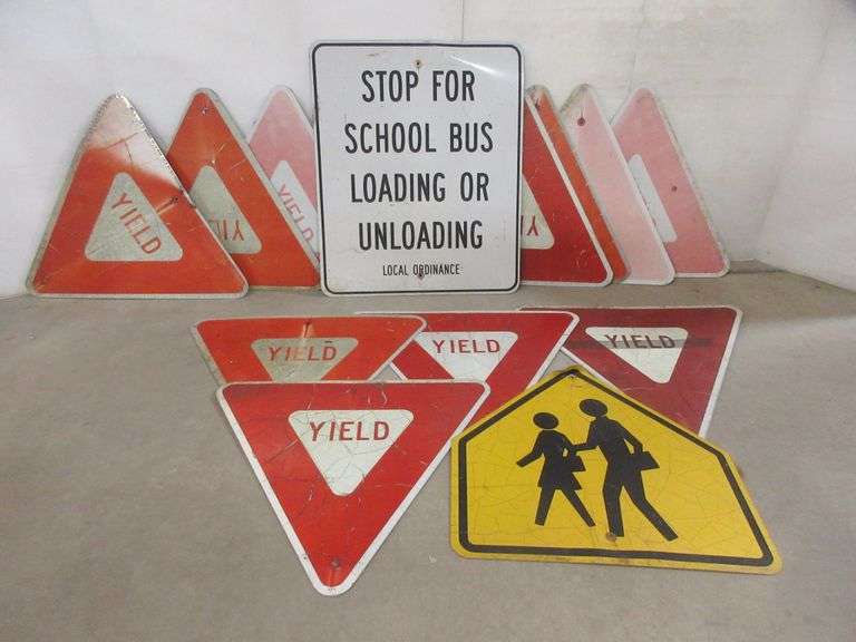 (13) Older road signs: 11- “Yield” signs, 1- “Pedestrian X-ing” sign ...
