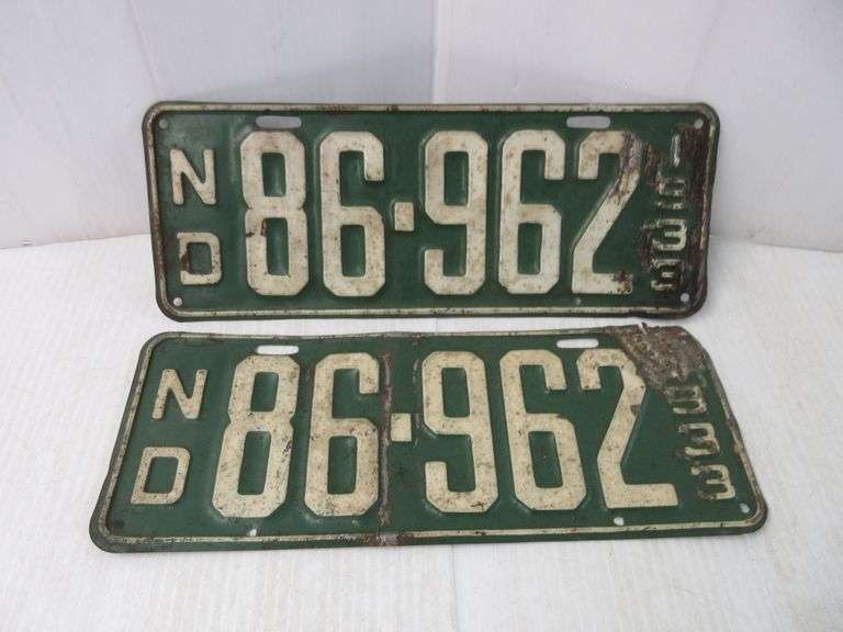 (2) 1933 North Dakota license plates, 13”W, original paint, have wear ...